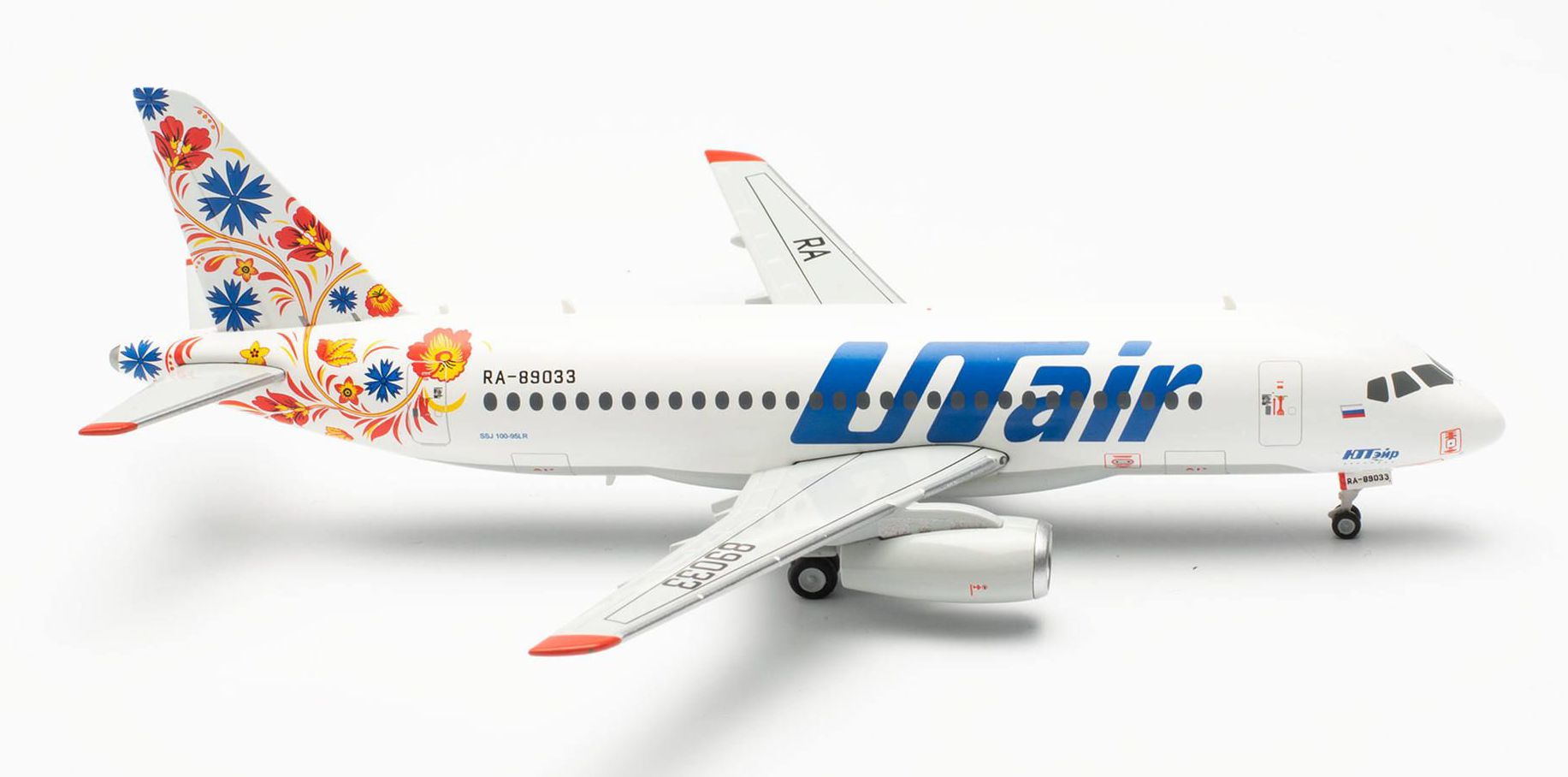 Herpa 572897 - UTair Express Sukhoi Superjet 100 - RA-89033